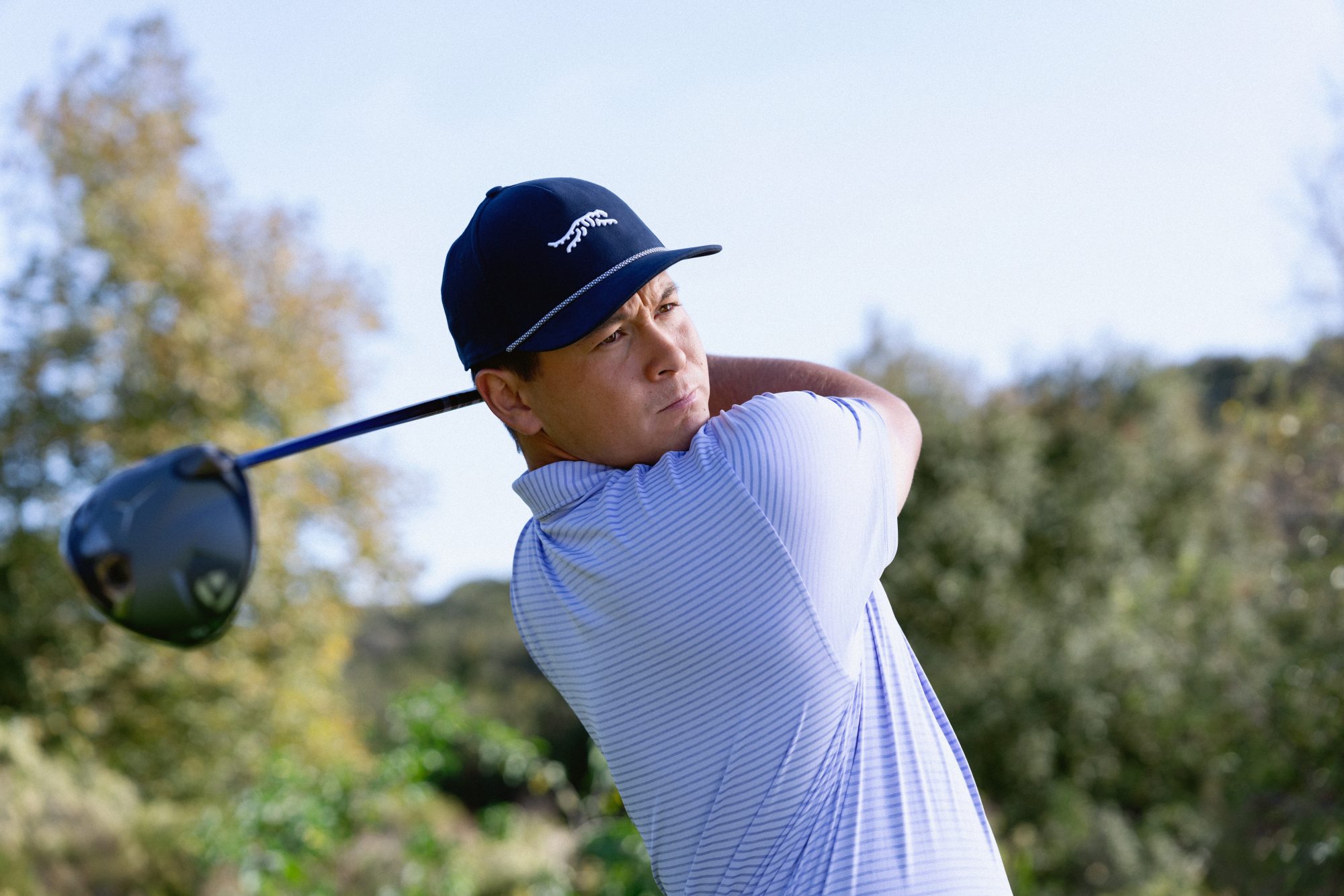 Tiger Woods Signs First PGA Tour Player to Wear Sun Day Red